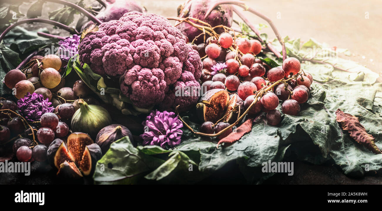 Various autumn purple fruits and vegetables, close up Stock Photo - Alamy