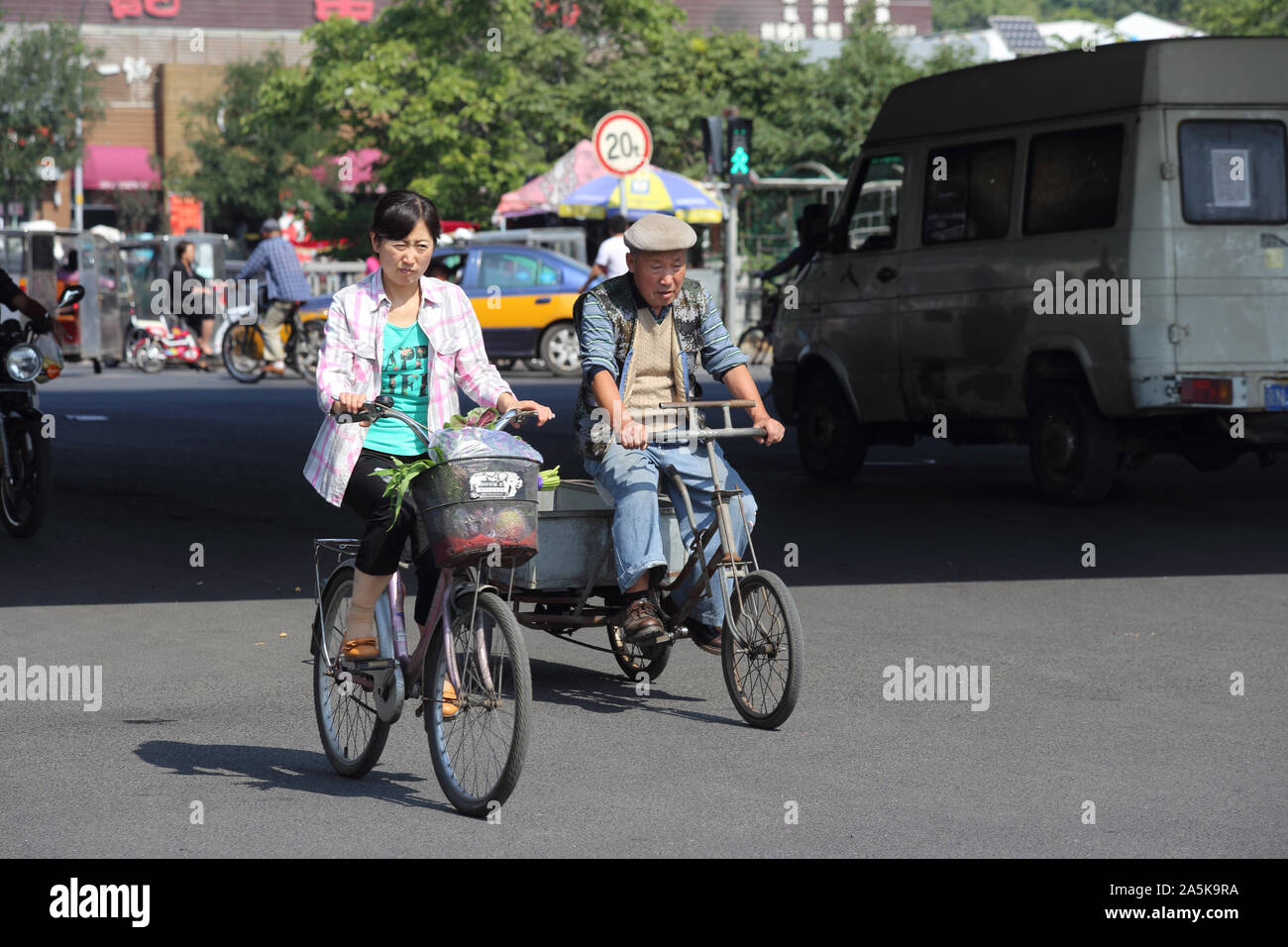 People biking china hi-res stock photography and images - Alamy