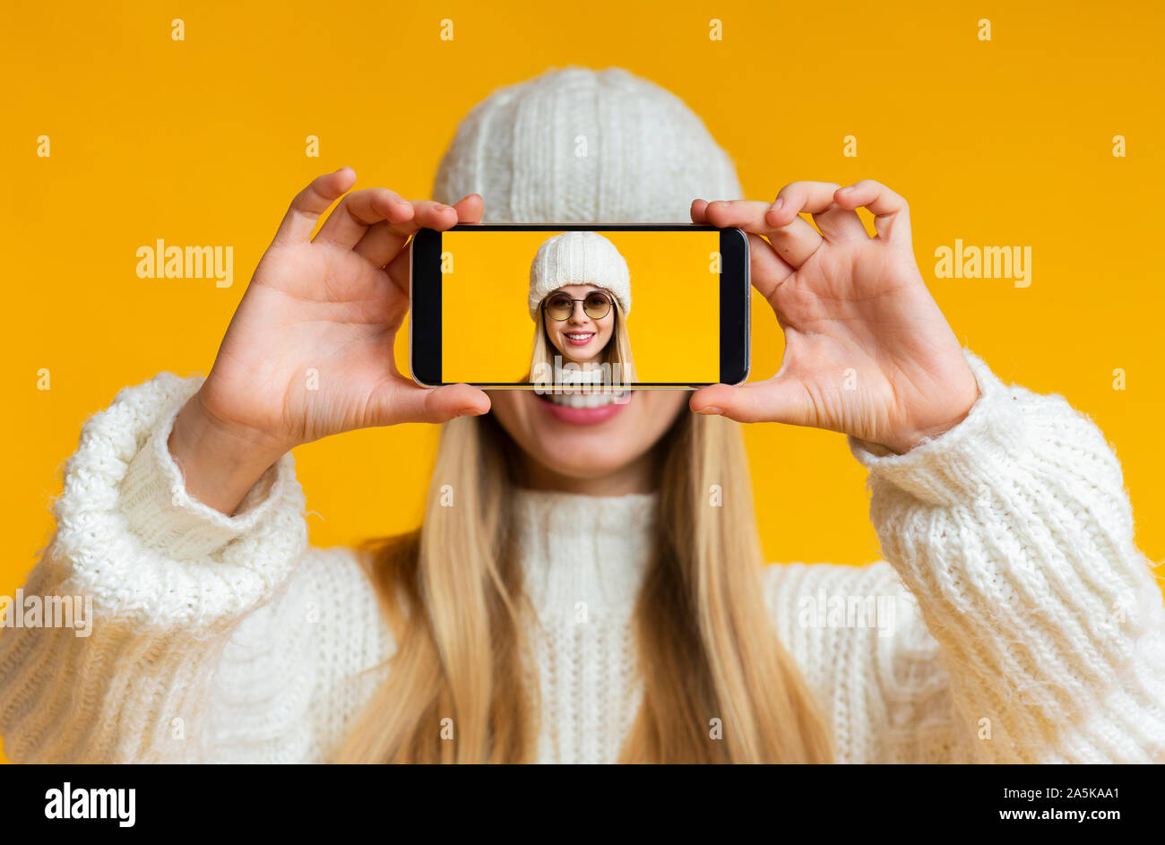 Selfie phone covering face woman hi-res stock photography and images ...
