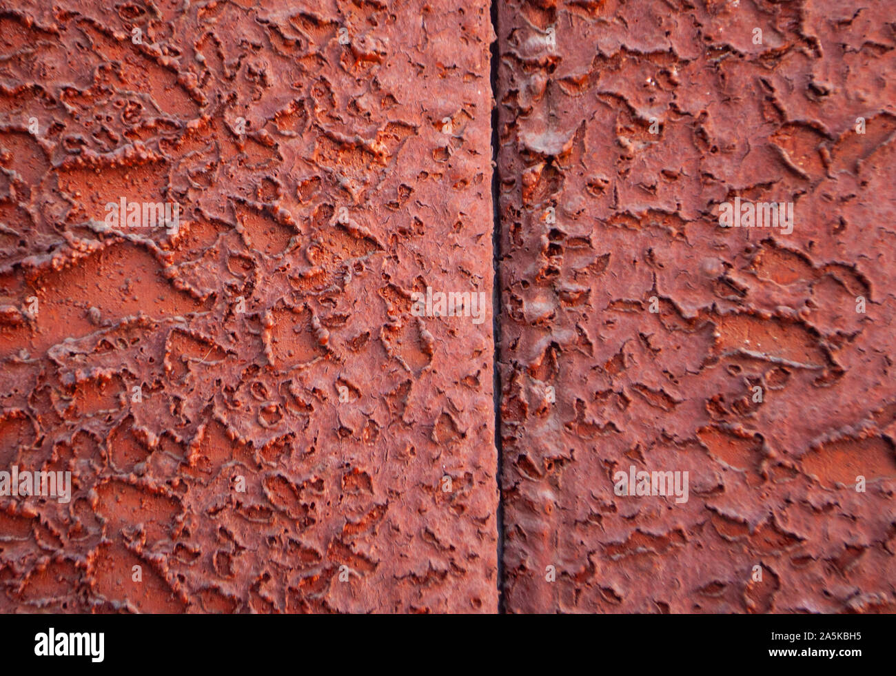 Old cracked red color mettalic background. Cracked paint on an old ...