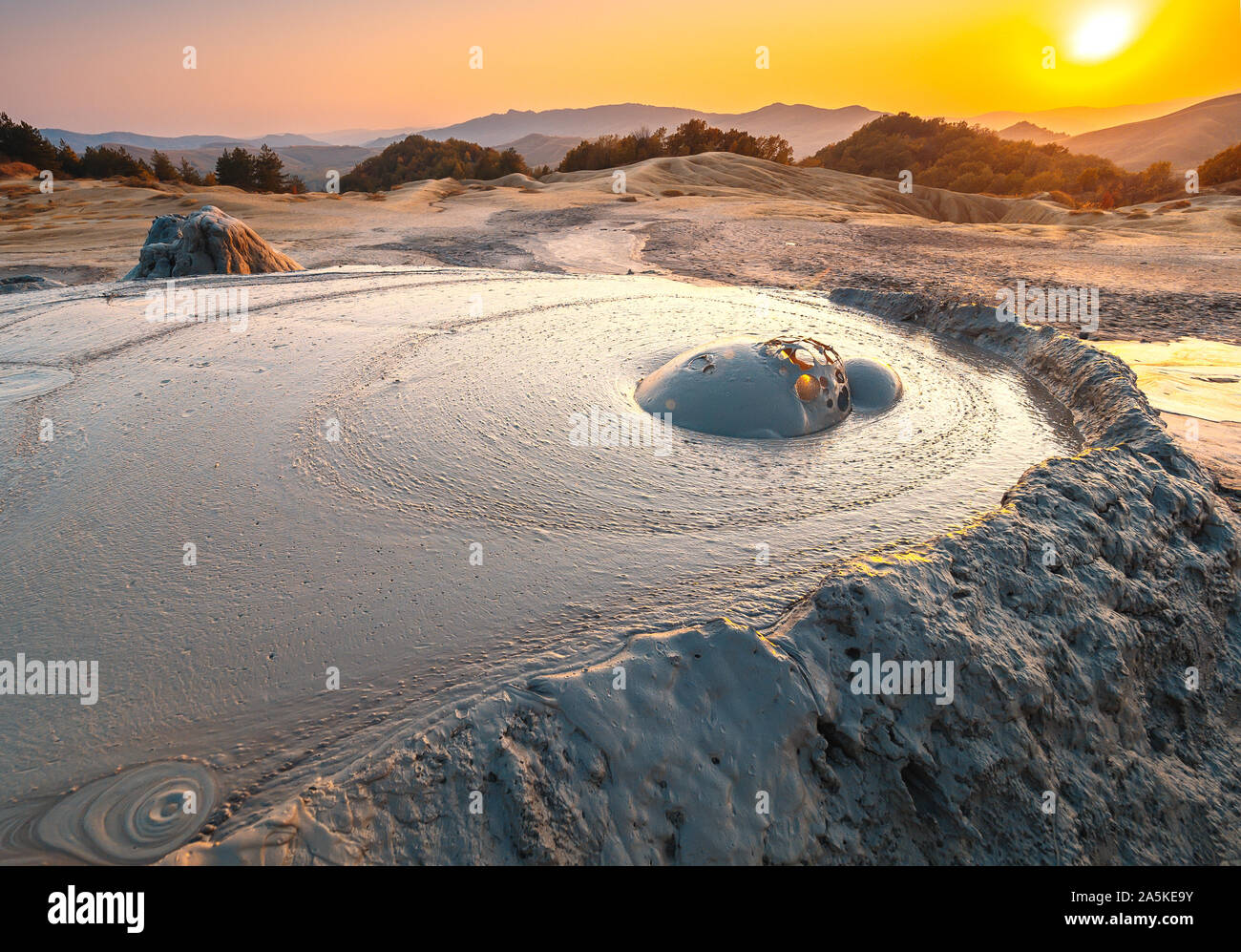 Eruption of muddy volcanoes in Paclele Mari near Buzau, Romania Stock ...