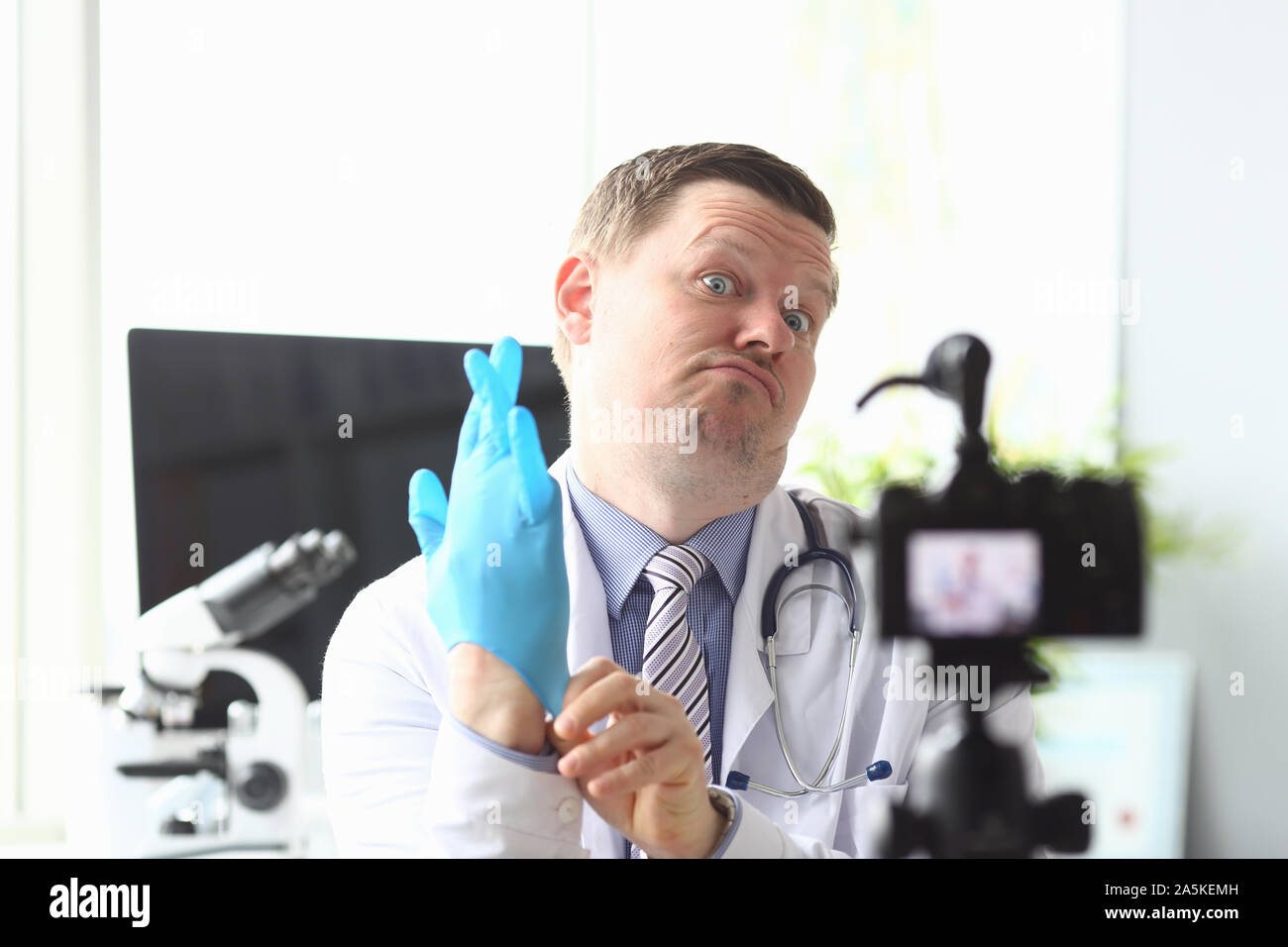 Joking smiling man Stock Photo - Alamy