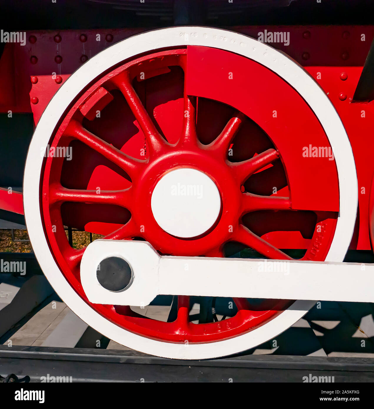 Red wheels of an old railway locomotive. Retro transport. Transport ...