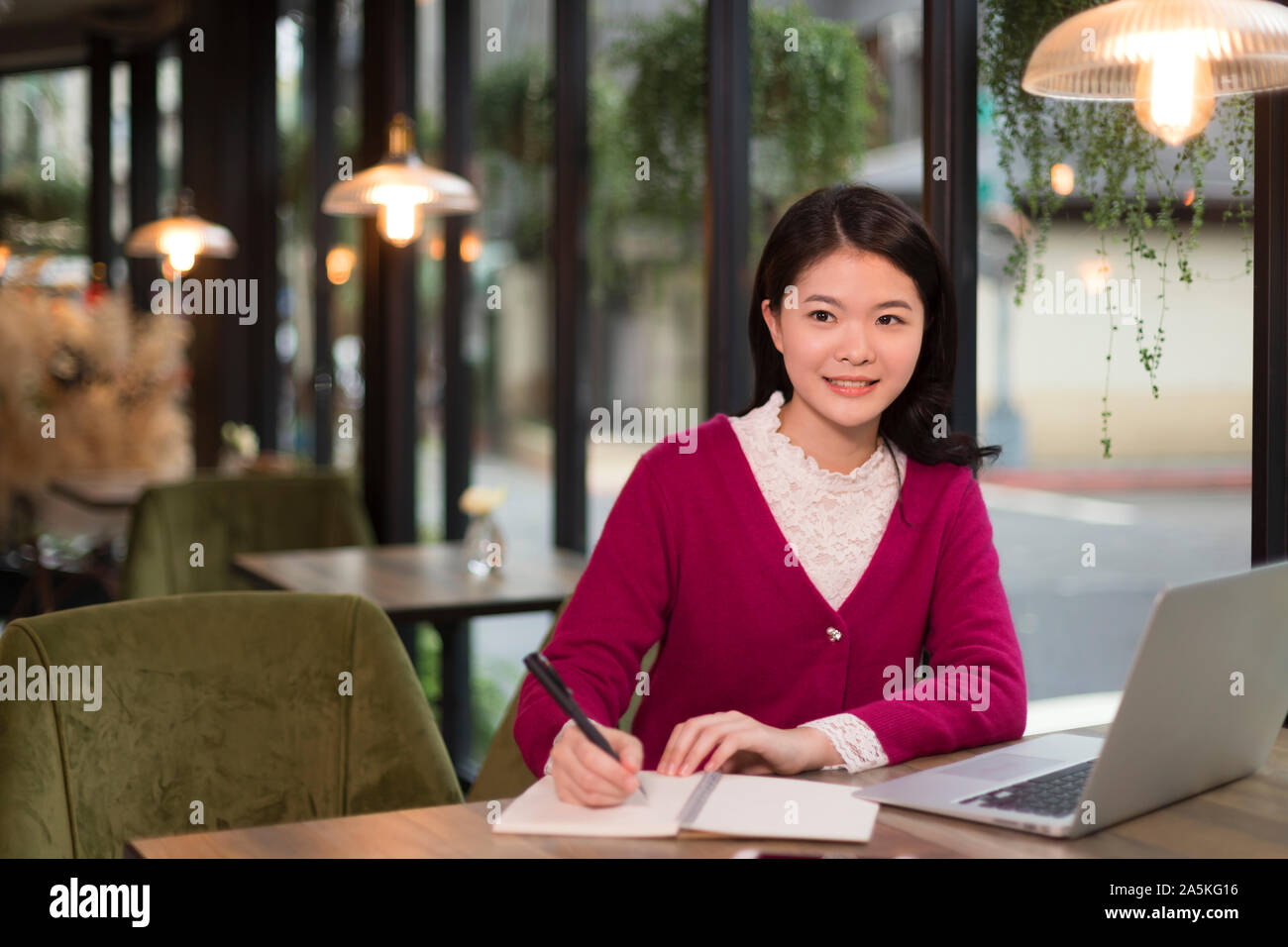Cafe woman smile hi-res stock photography and images - Alamy