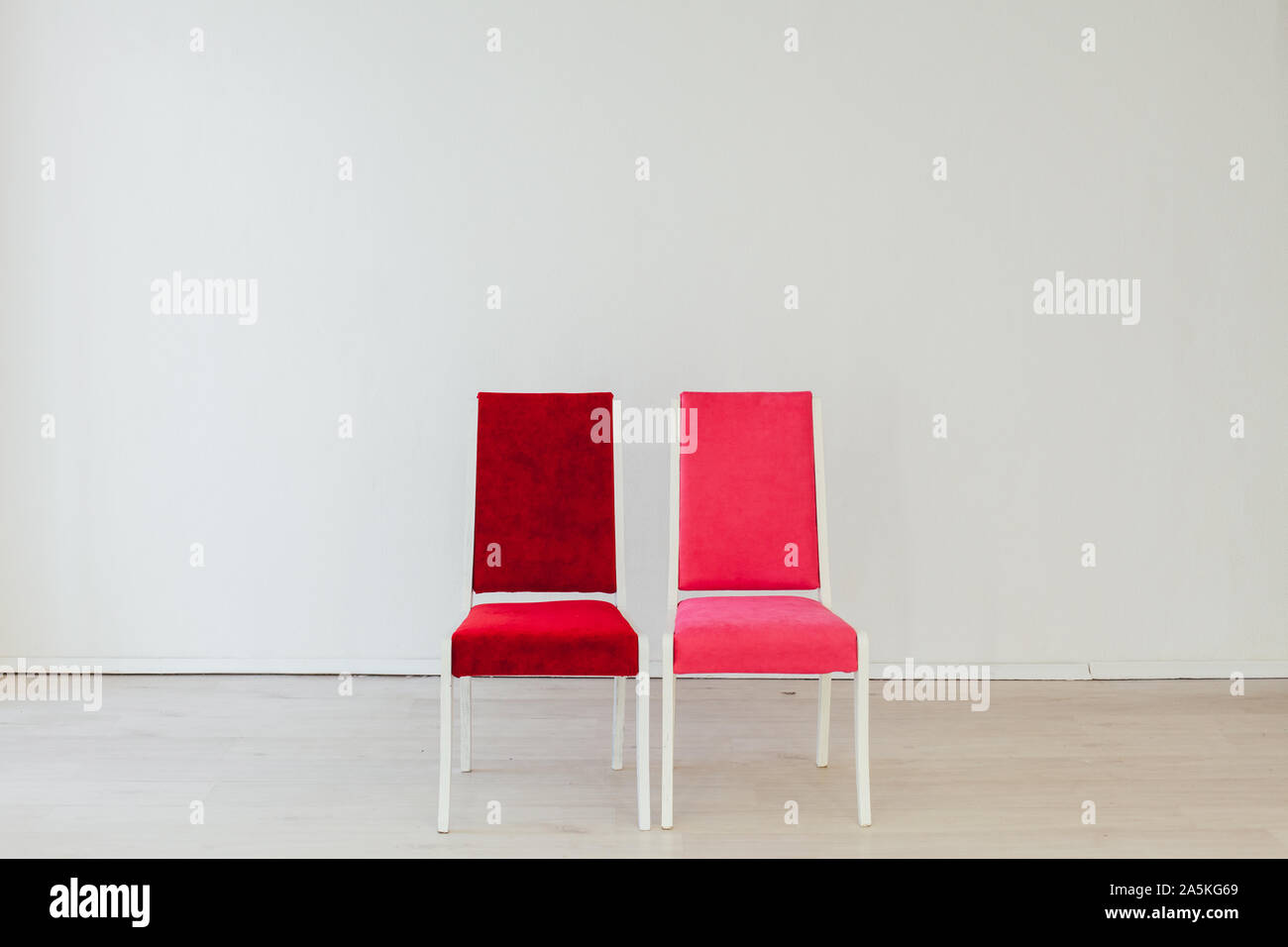 two chairs in the interior of an empty white room Stock Photo - Alamy