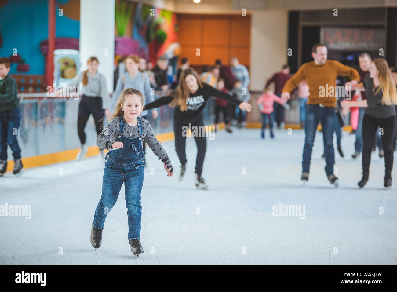 LVIV, UKRAINE - February 3, 2019: people skating on ski rink in city ...