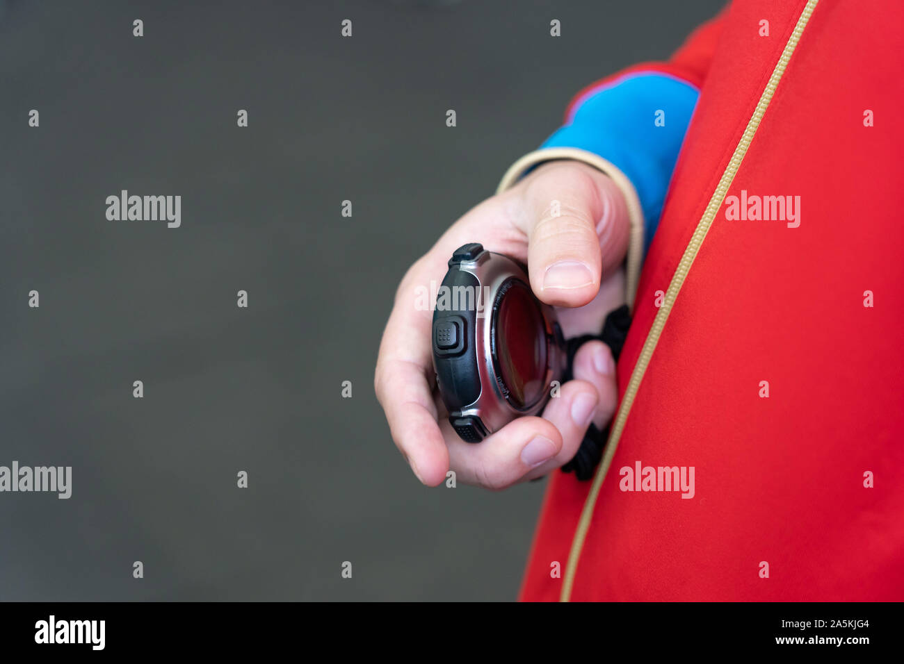 Stopwatch timer a in man s hand. Man's hand with a stopwatch Stock ...