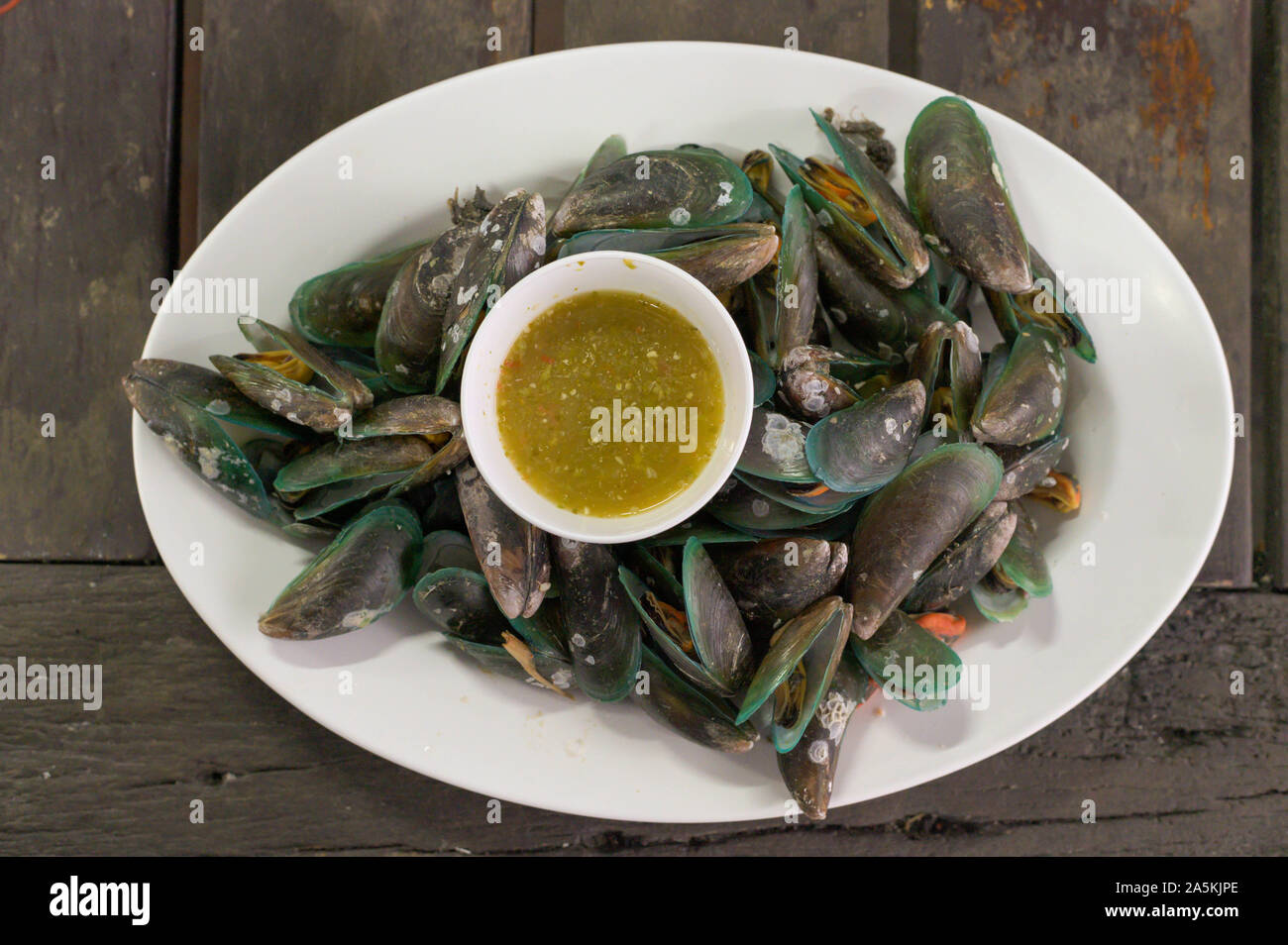 Baked Mussels with Sweet basil Stock Photo - Alamy