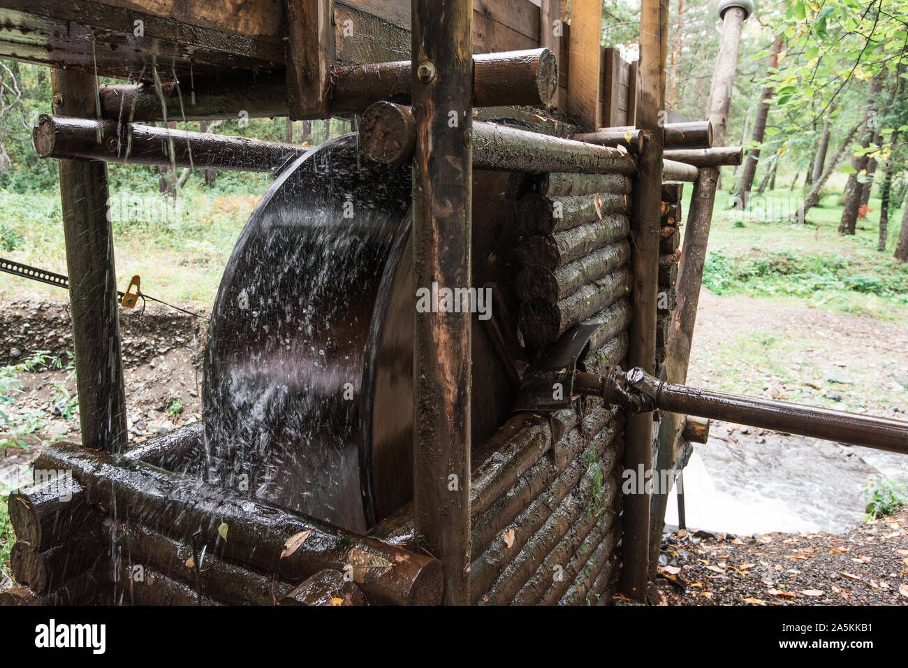 Rustic watermill with wheel Stock Photo - Alamy