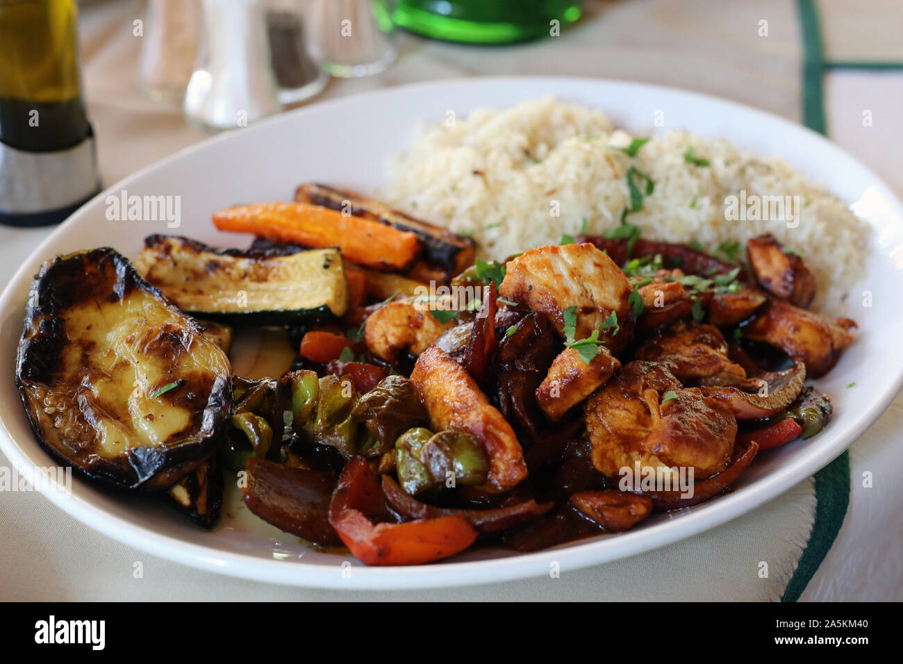 Dinner in Cyprus including some spicy meat, boiled rice and grilled ...