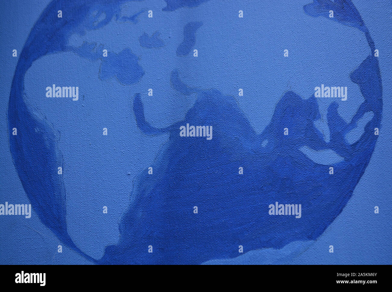 Map of the world on blue background Stock Photo - Alamy