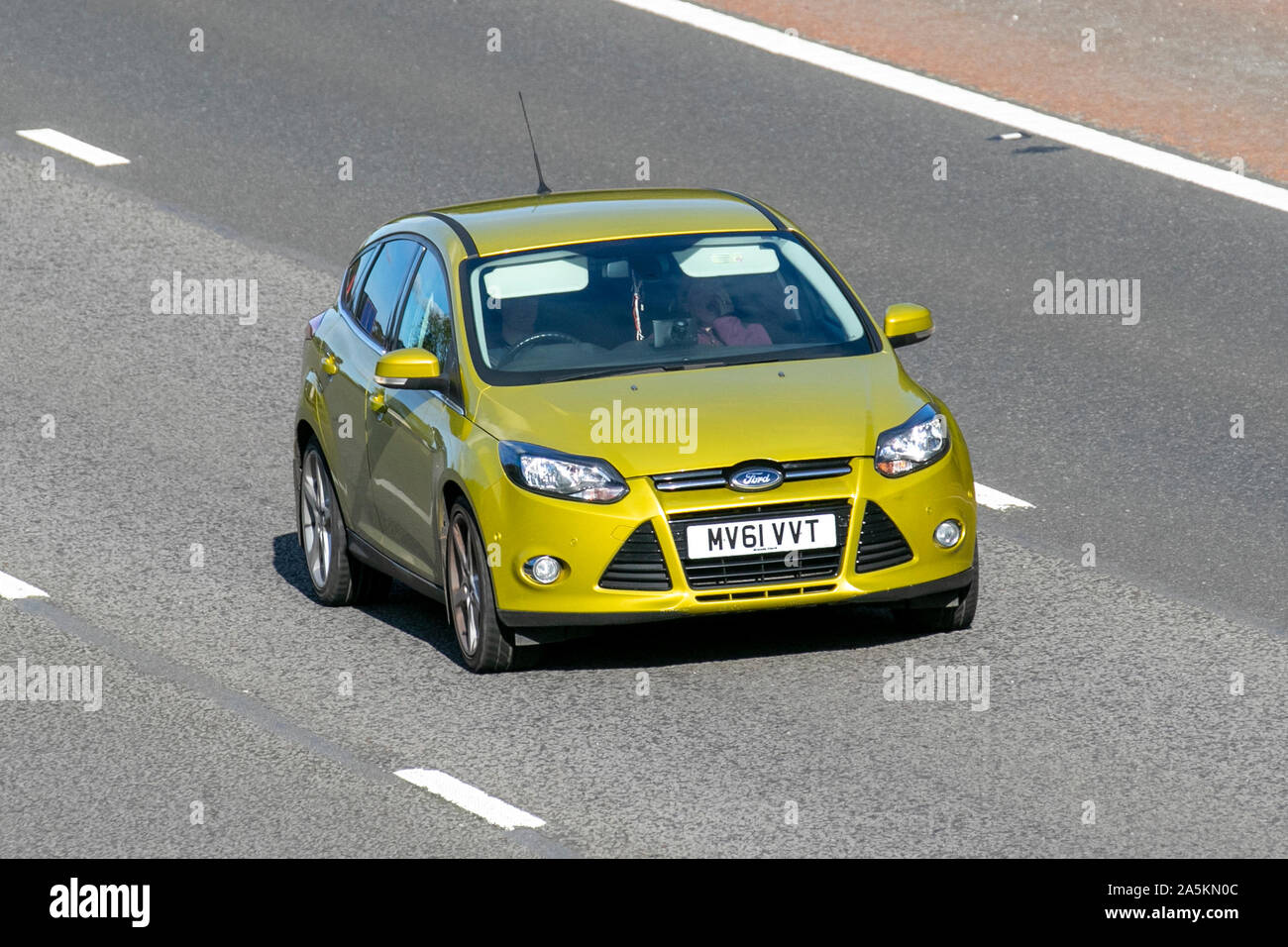 2011 yellow green Ford Focus Titanium 125; UK Vehicular traffic ...
