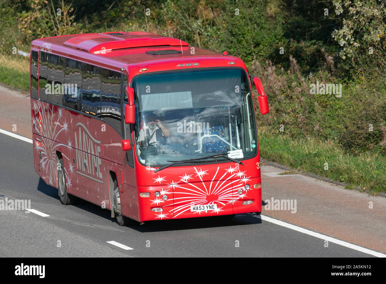 MAYNE Mayne red buses, 2019 Volvo coaches, coach on the M6 motorway ...