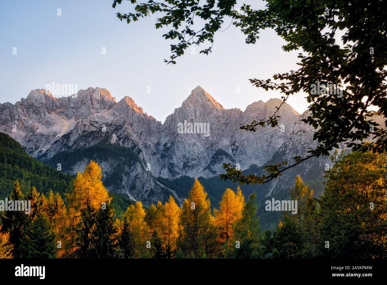 Landscape view of mountain peaks and colorful autumn foliage, Triglav national park, Slovenia ...