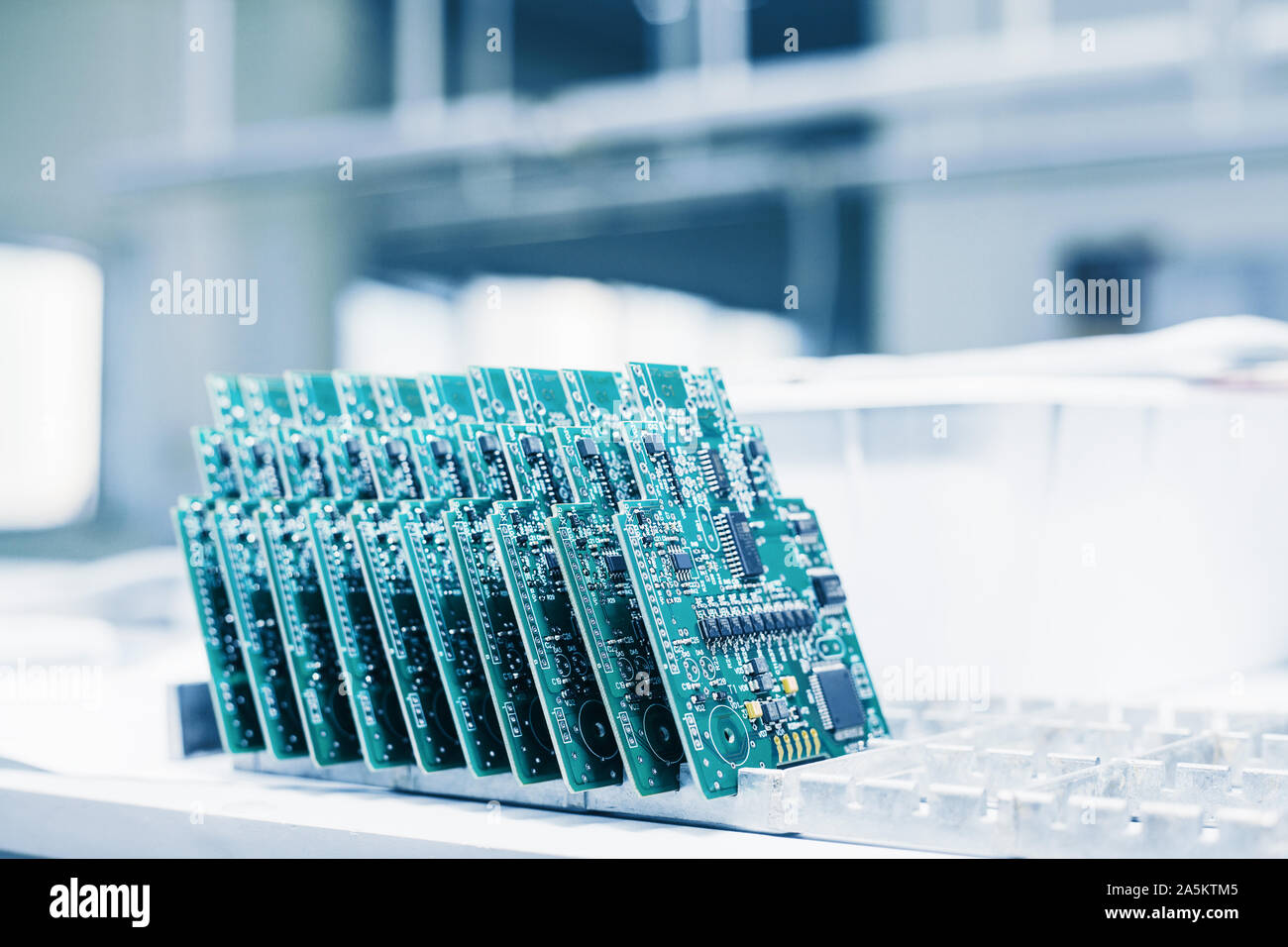 Computer boards stand in a row. Computer techologies. Spare parts ...