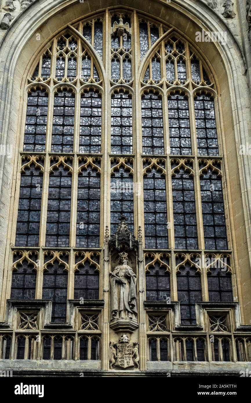 Large stain glass arch window exterior on the west front of Bath Abbey ...