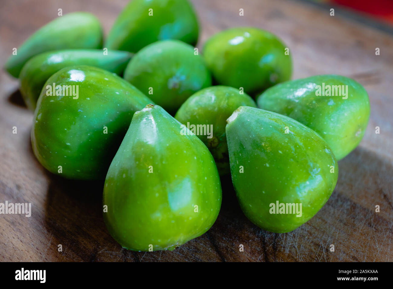 Fig - fresh fig fruits close-up showing texture on cutting board Stock ...