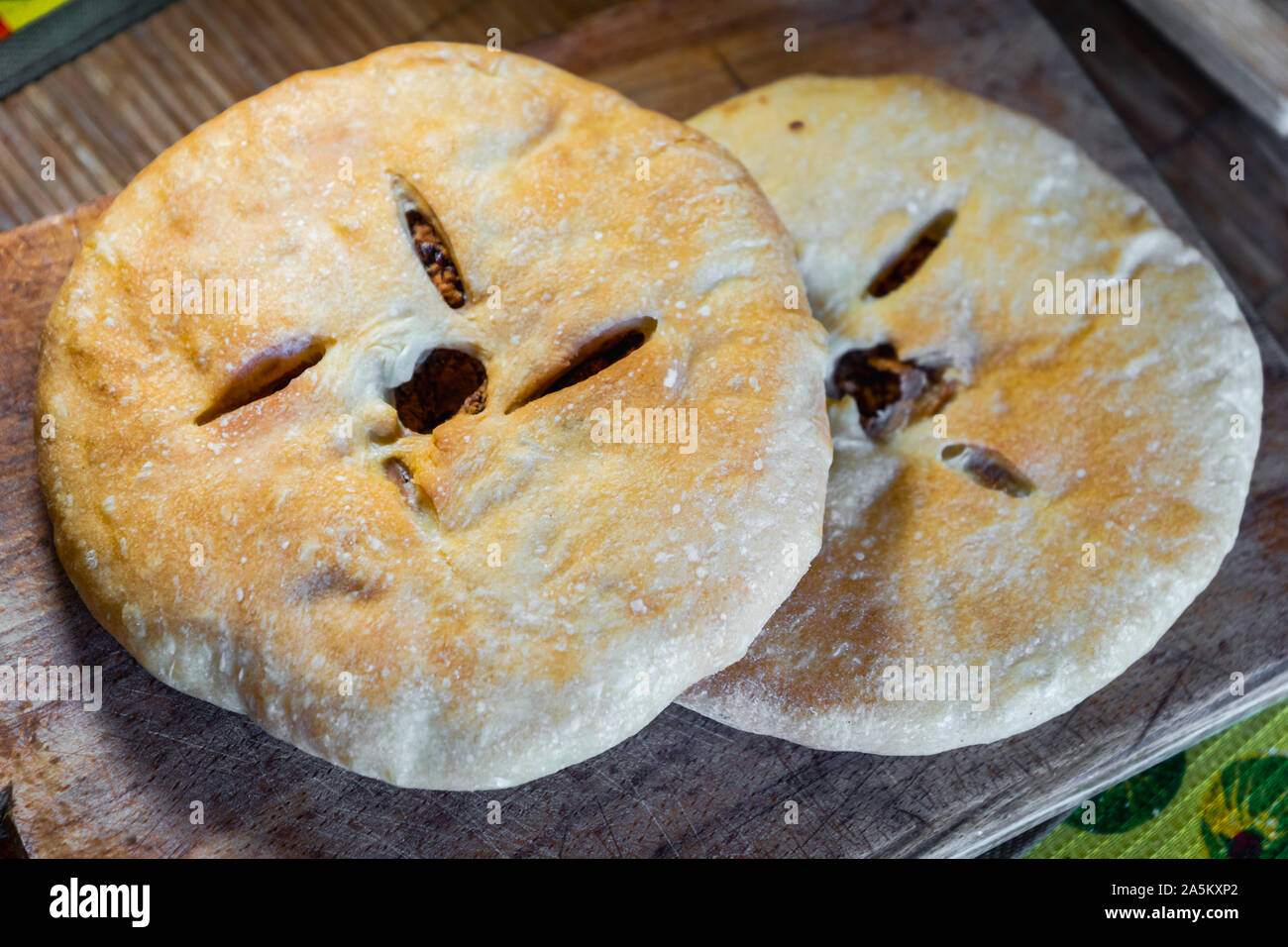 Lobiani, traditional Georgian flatbread with red beans stuffing, close ...