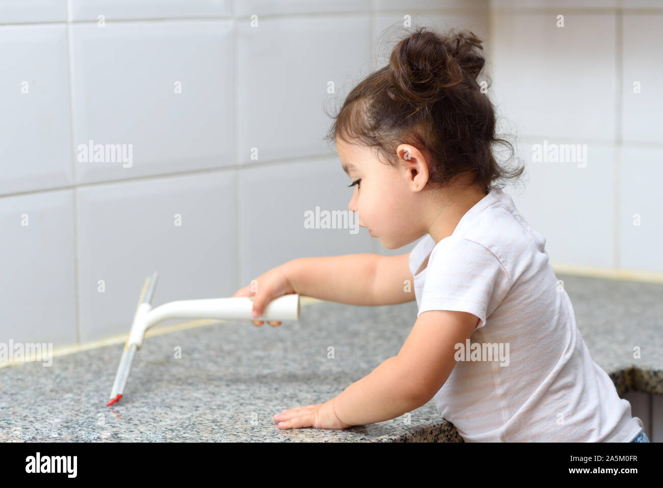 Children doing housework hi-res stock photography and images - Alamy
