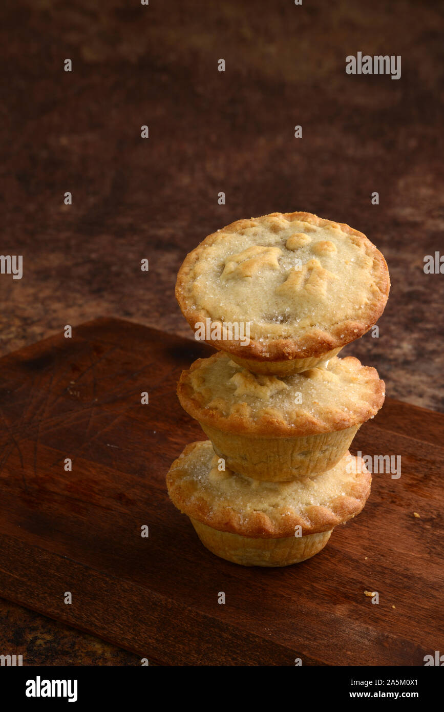 three stack of mincemeat pies Stock Photo - Alamy