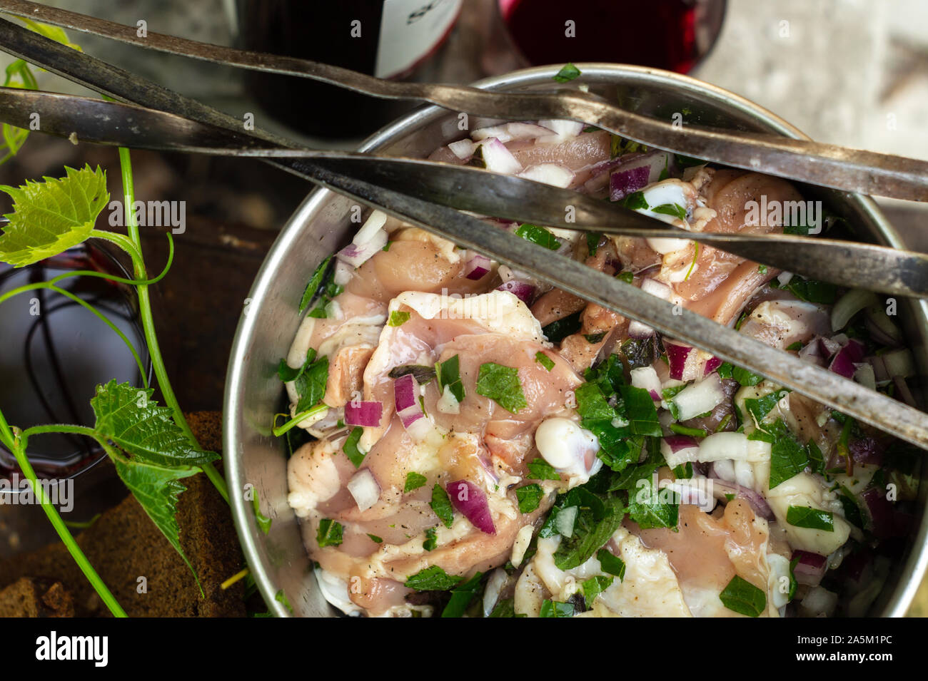 Chicken marinated with herbs and spices for cooking grilled Stock Photo ...