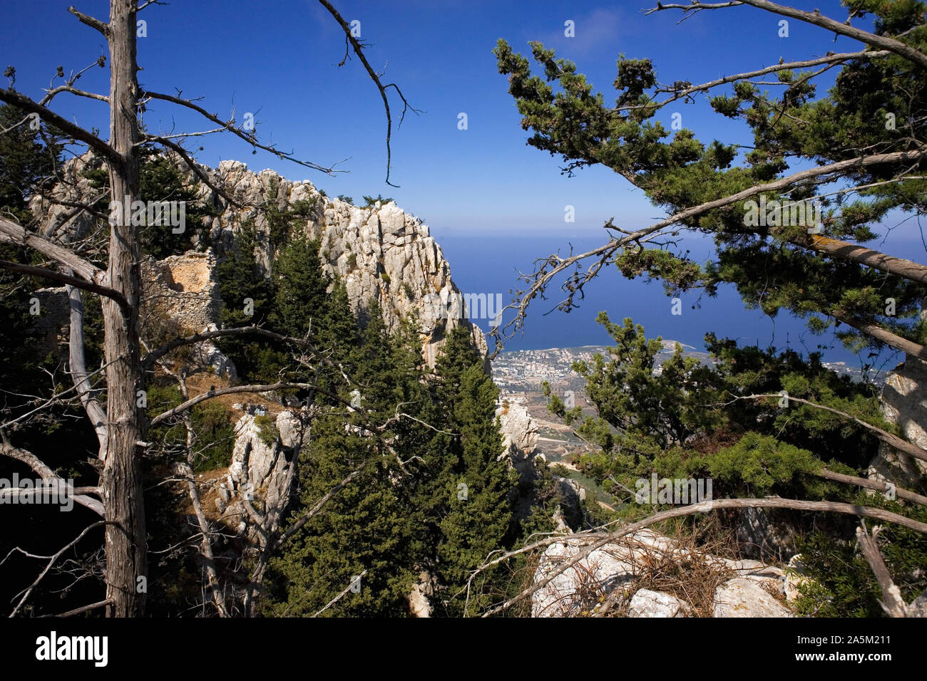 Mountain cliffs and trees at Saint Hilarion Castle, Northern Cyprus ...