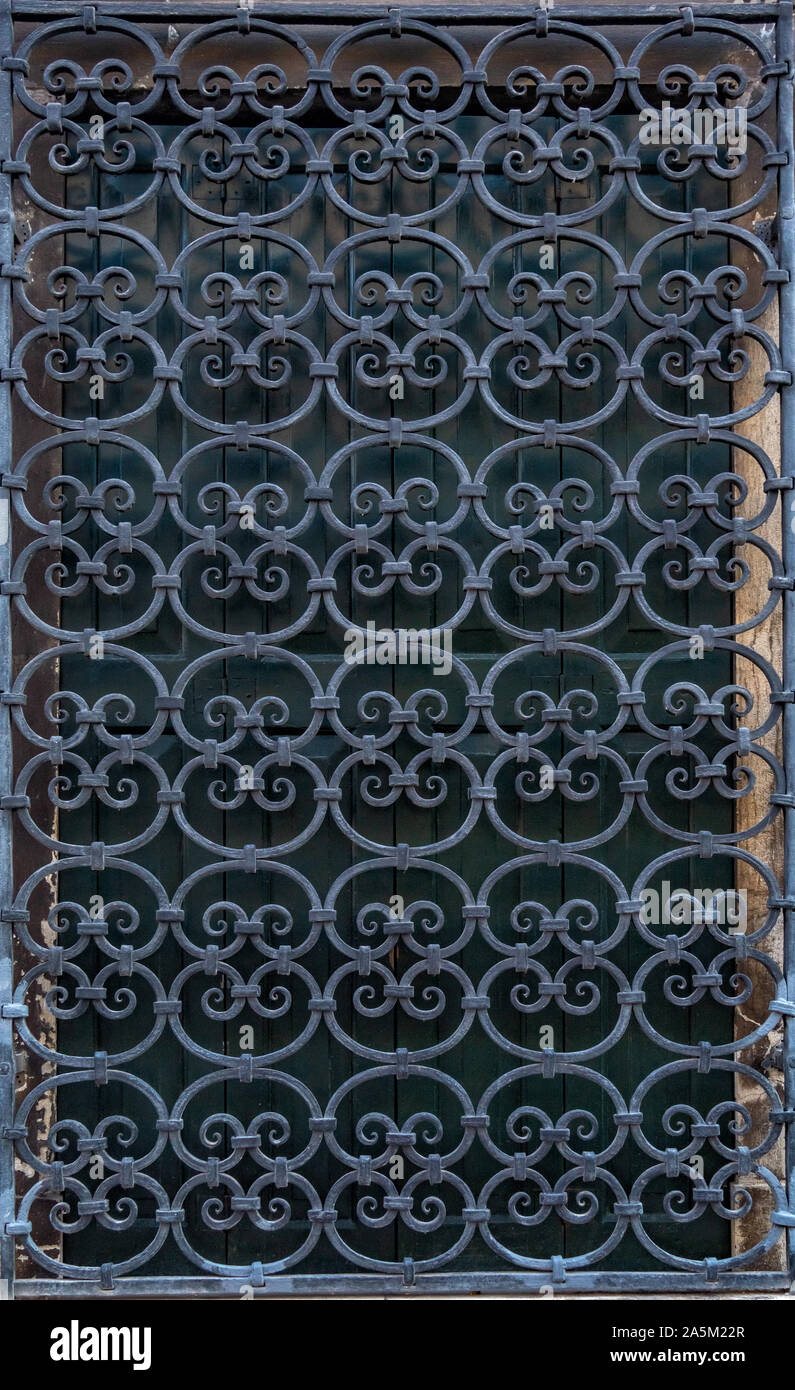 Forged antique openwork metal grid on the window Stock Photo - Alamy