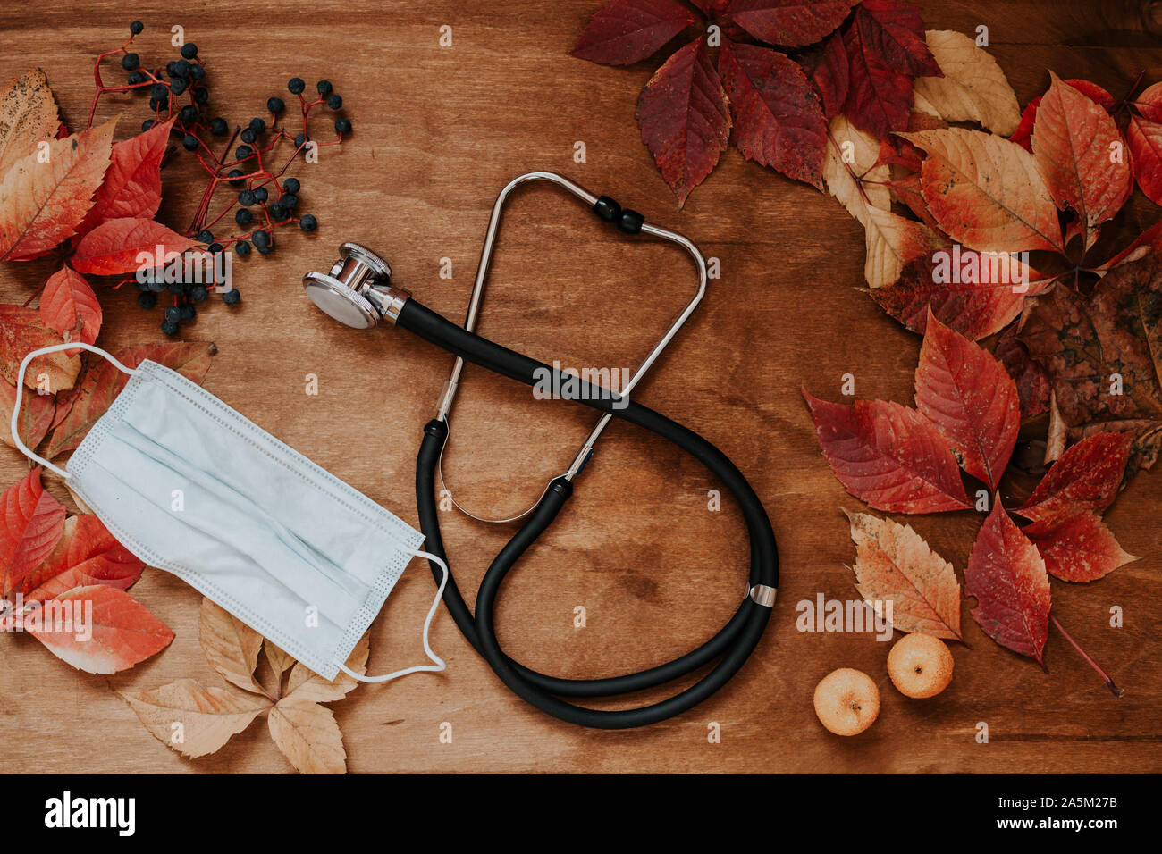 doctor stethoscope and yellow leaves autumn background Stock Photo - Alamy