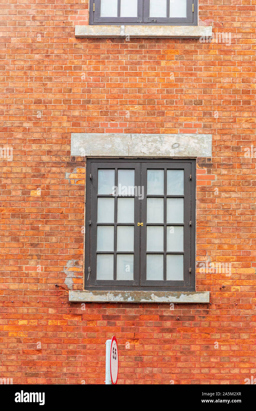 Closed Window at Brick House Exterior Stock Photo - Alamy
