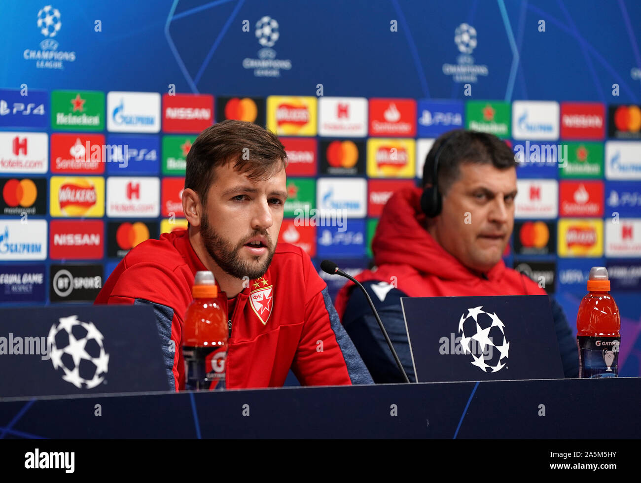 Red Star Belgrade's Nemanja Milunovic (left) and manager Vladan ...