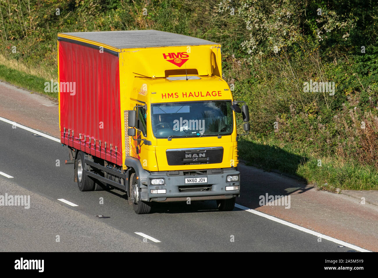 Vans yellow lorry lorries truck trucks hi-res stock photography and ...