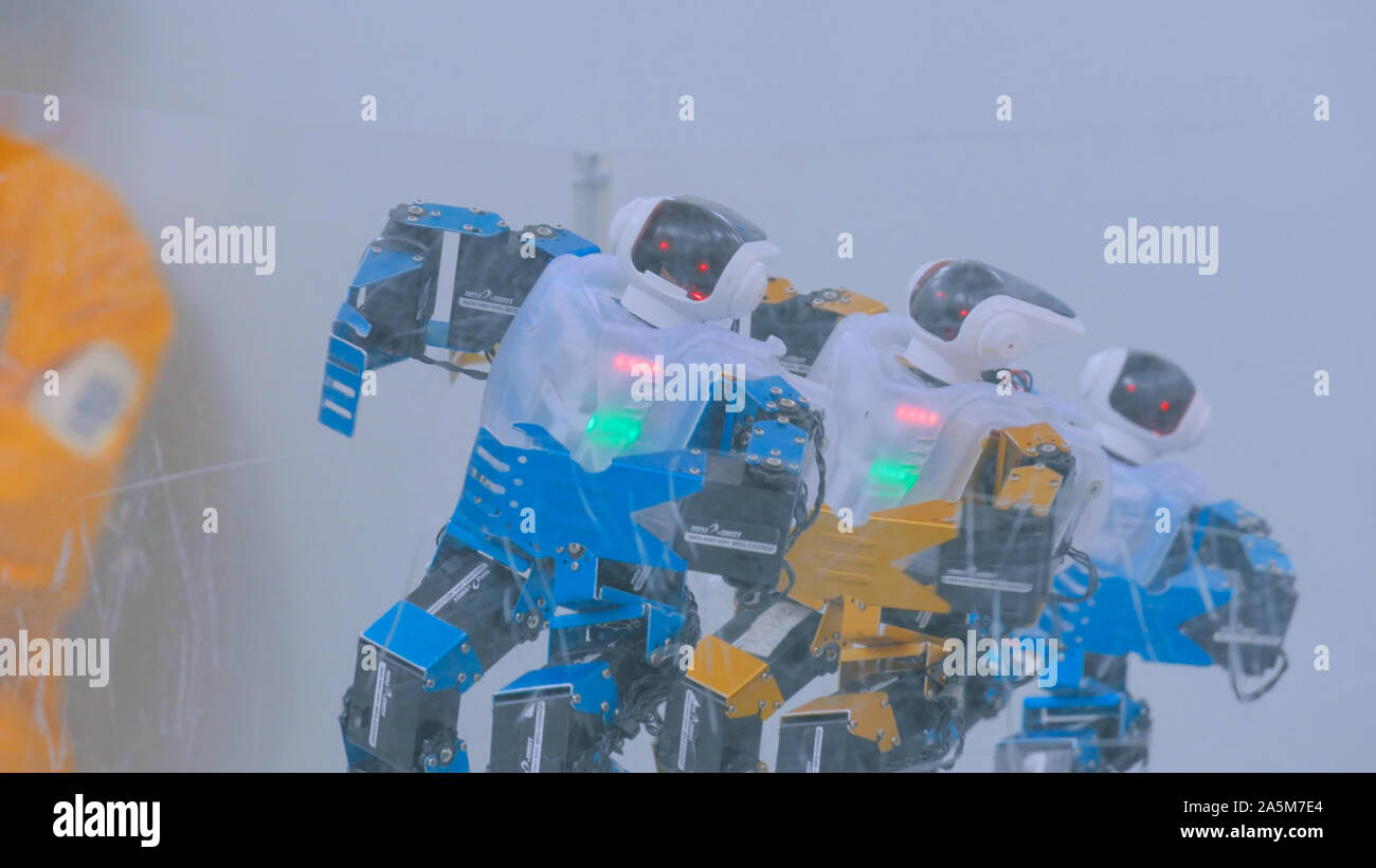 Humanoid robots dancing at robotic show Stock Photo - Alamy