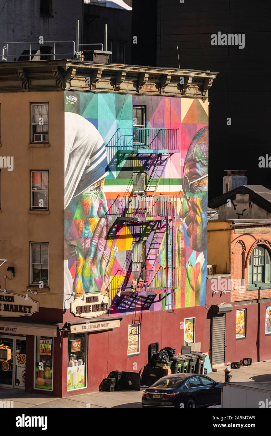 wall painting of Ghandi and Mother Theresa on building in New York City ...