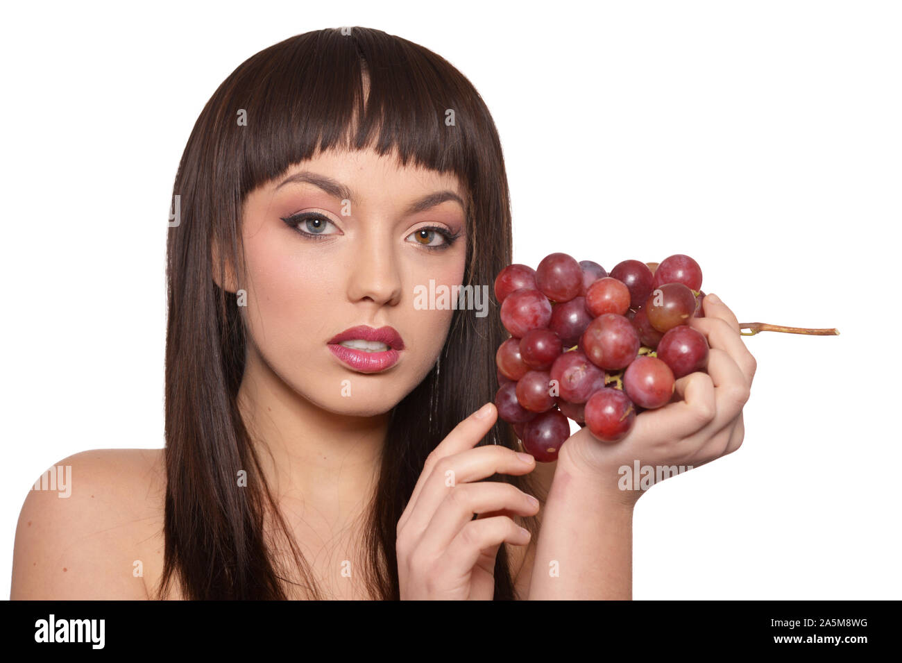 Woman grapes face hi-res stock photography and images - Alamy