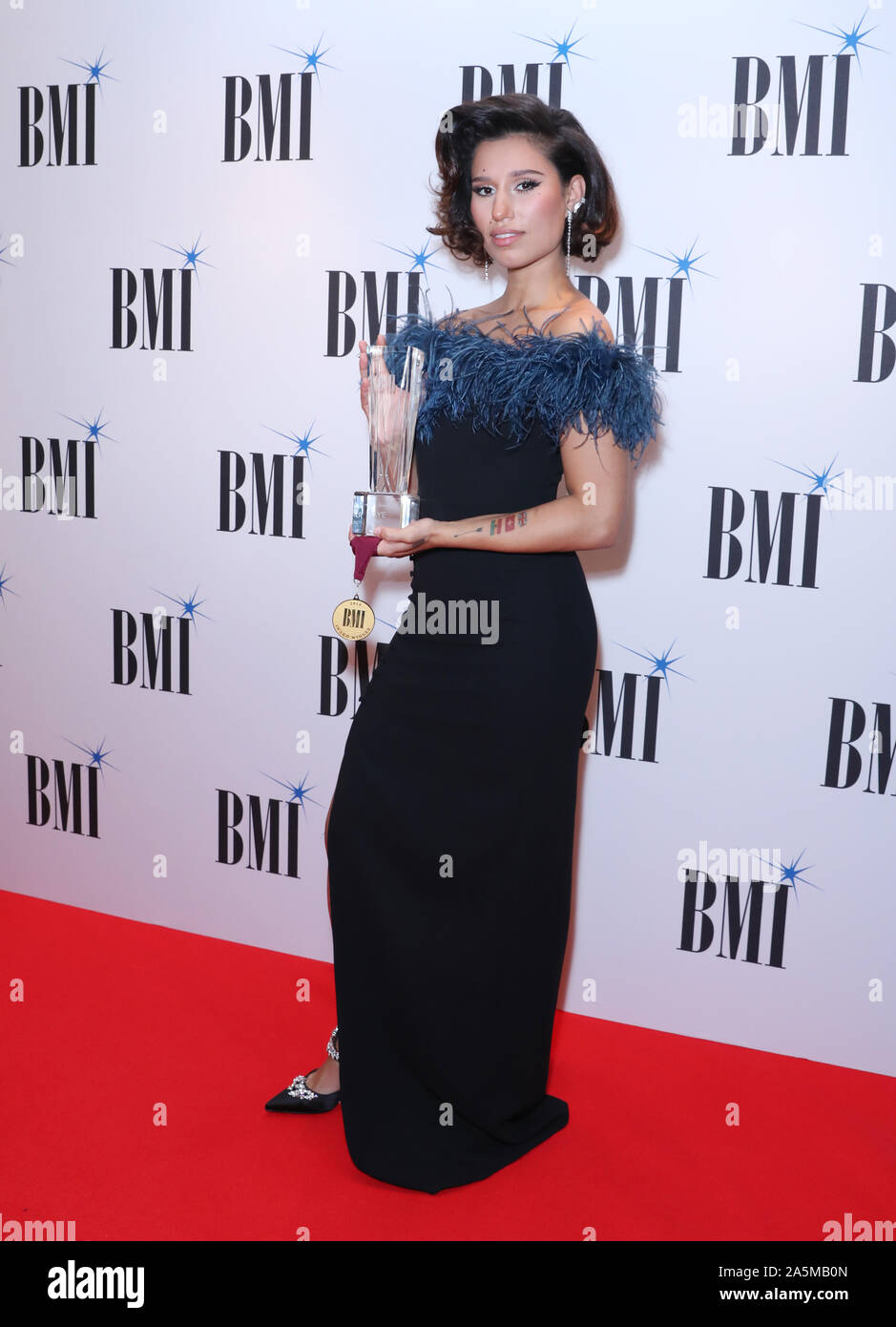 RAYE receives an honour award during the BMI London Awards 2019 at the ...