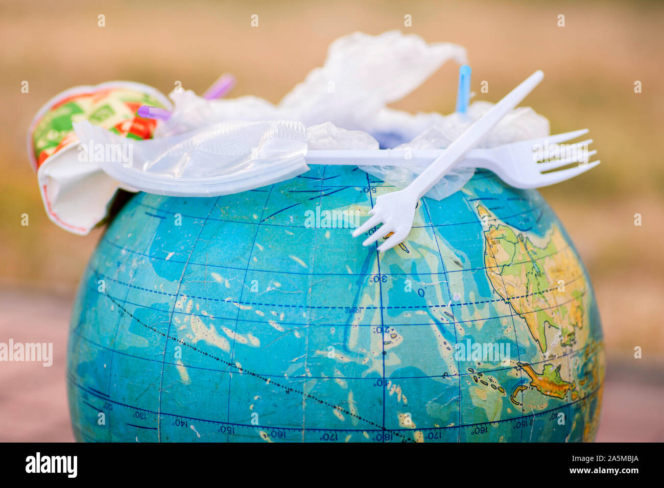 Globe filled with plastic trash. The concept of pollution by plastic ...