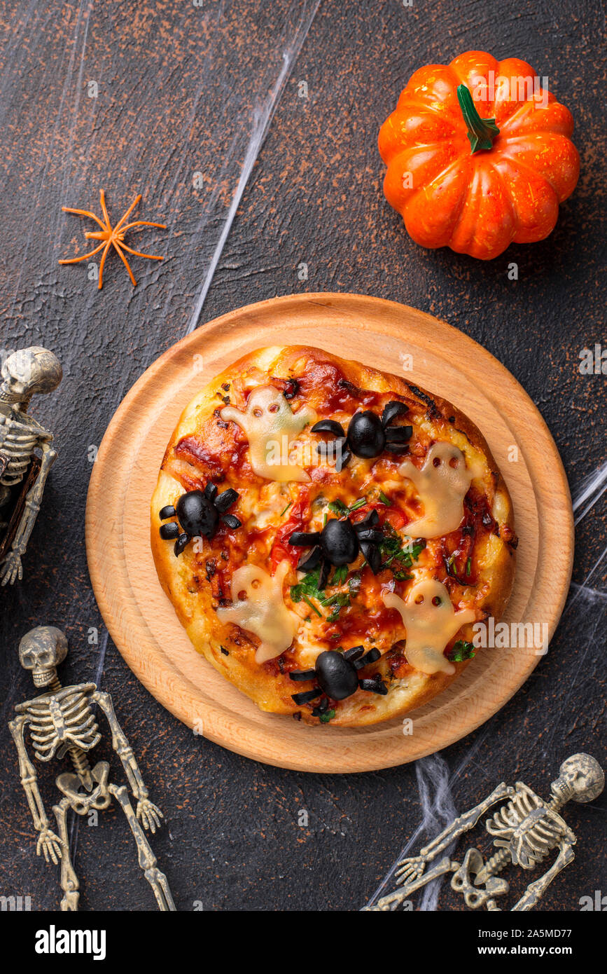 Halloween scary pizza decorated ghosts Stock Photo - Alamy