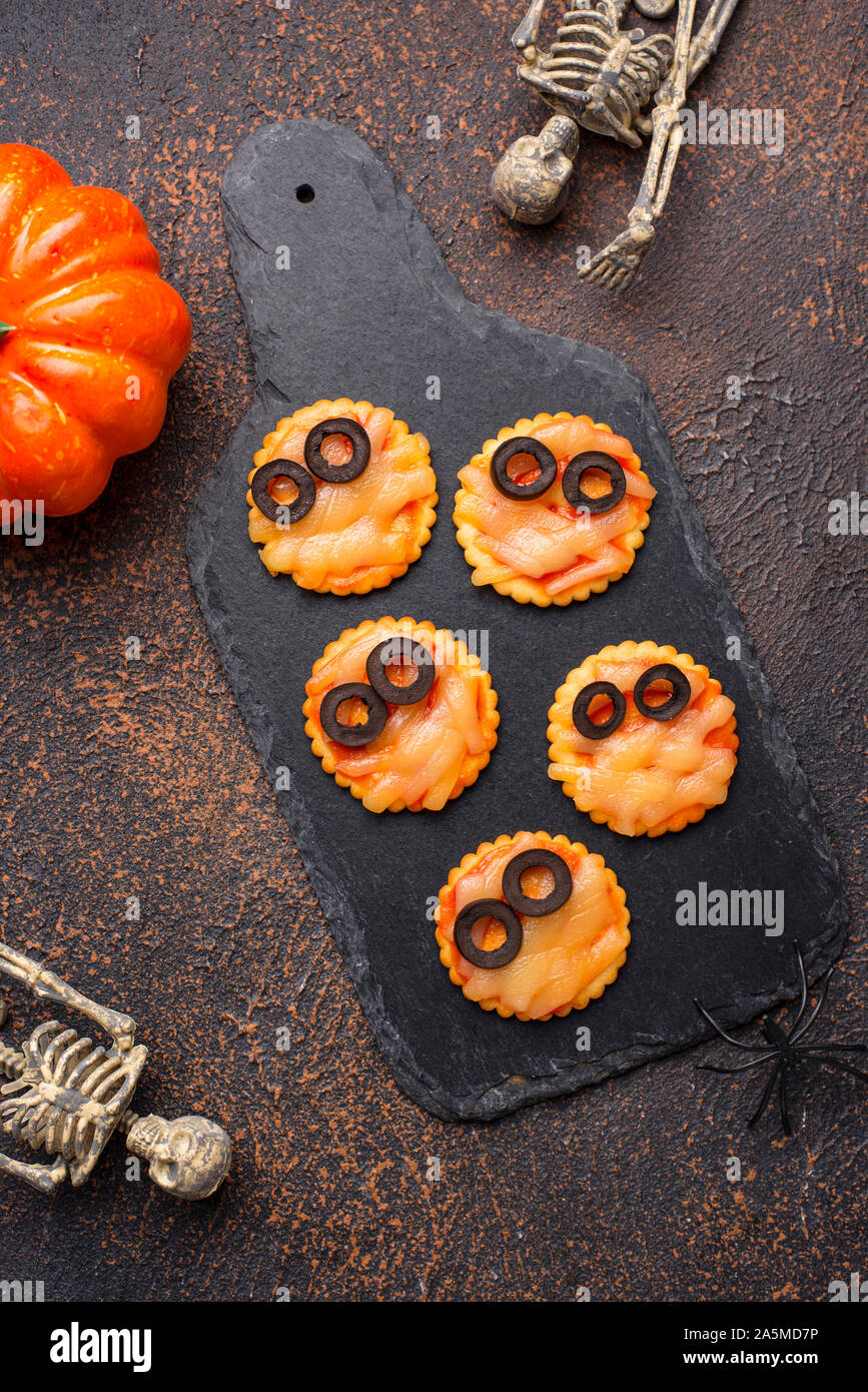 Halloween scary mini mummy pizza Stock Photo - Alamy
