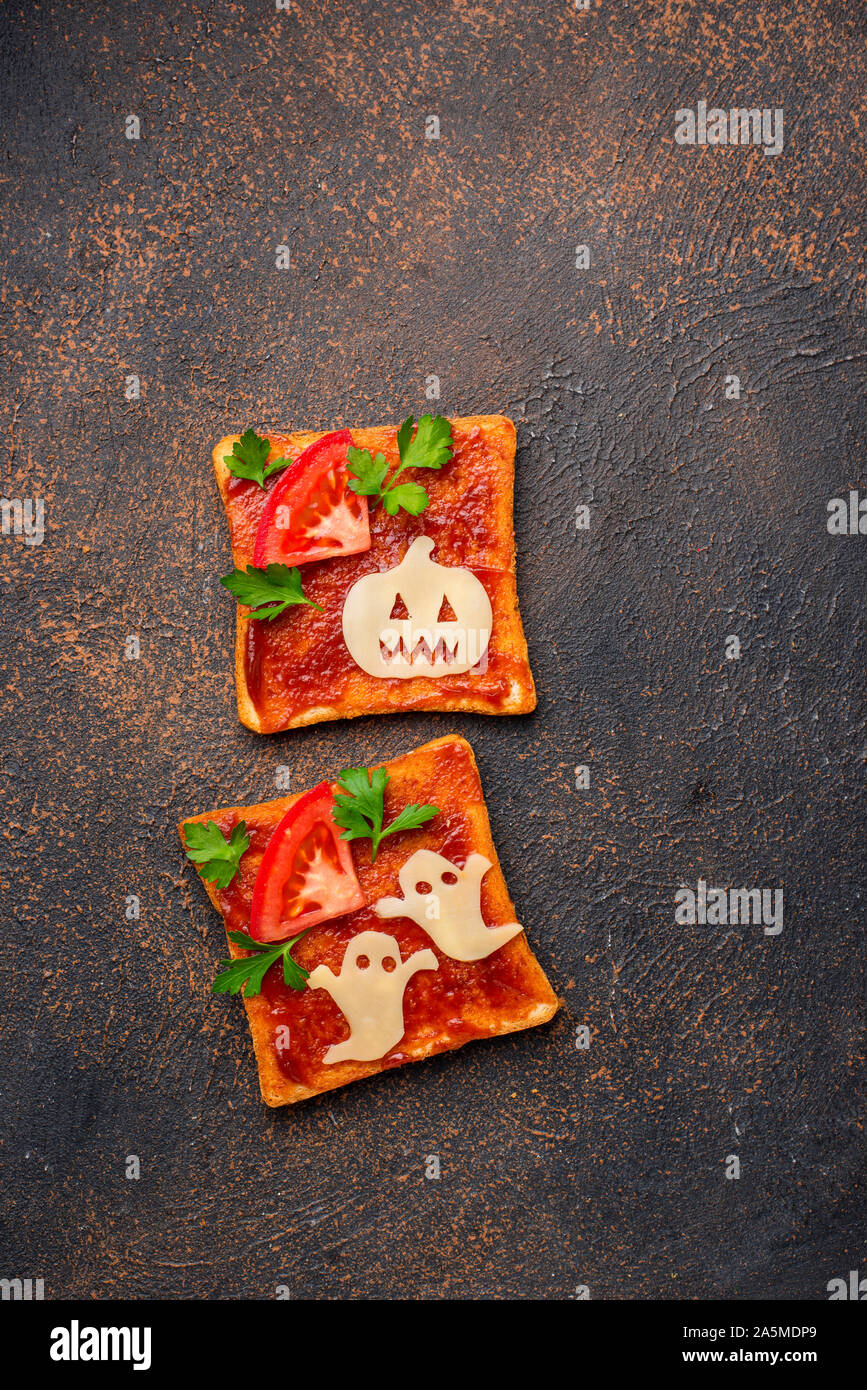 Halloween sandwiches toasts with ghost and pumpkin Stock Photo - Alamy