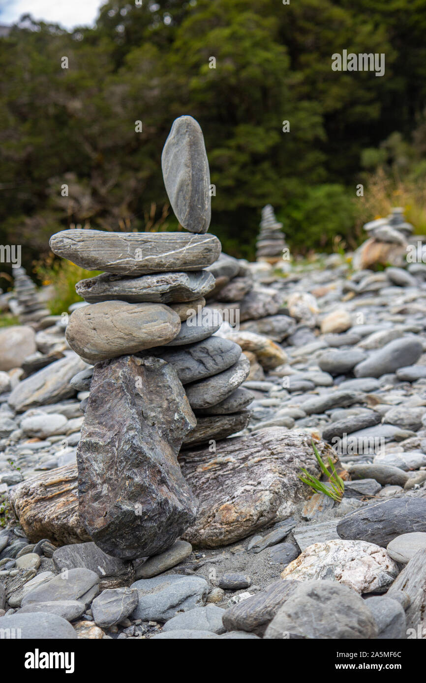 stone pyramids near fantail falls, Wanaka, New Zealand Stock Photo - Alamy