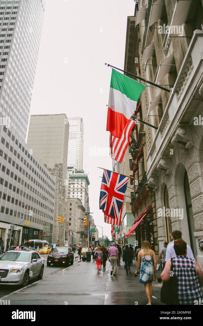 Yellow pedestrian street crossing flags hi-res stock photography and ...