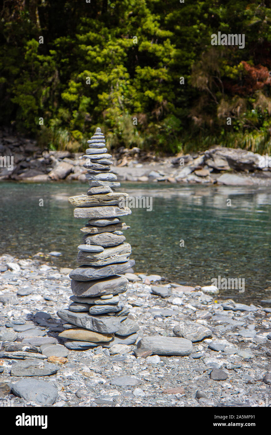 stone pyramids near fantail falls, Wanaka, New Zealand Stock Photo - Alamy