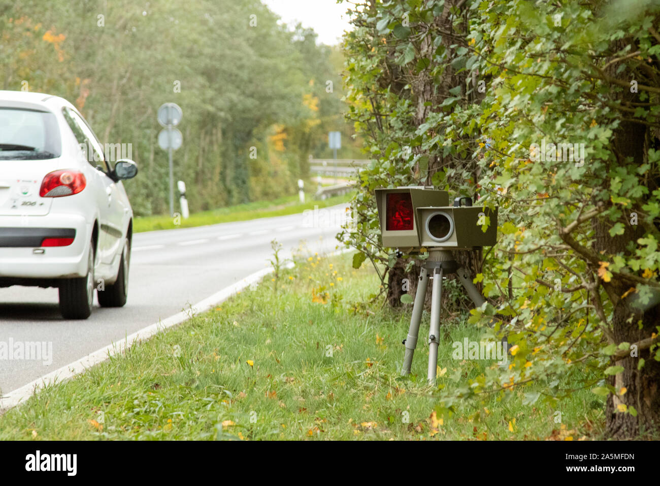 radar speed trap with car in motion Stock Photo - Alamy