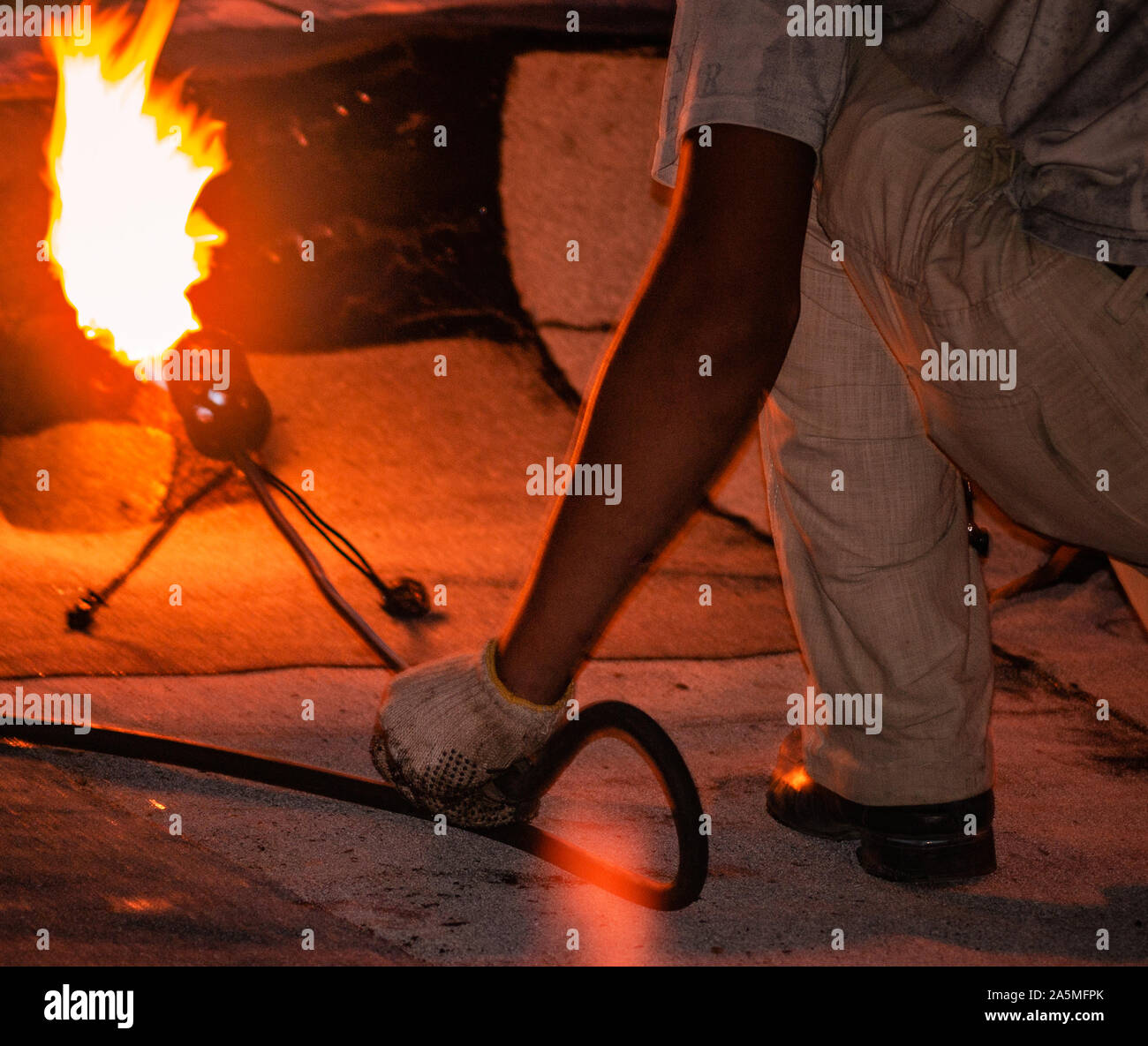 gas torch working at night Stock Photo - Alamy