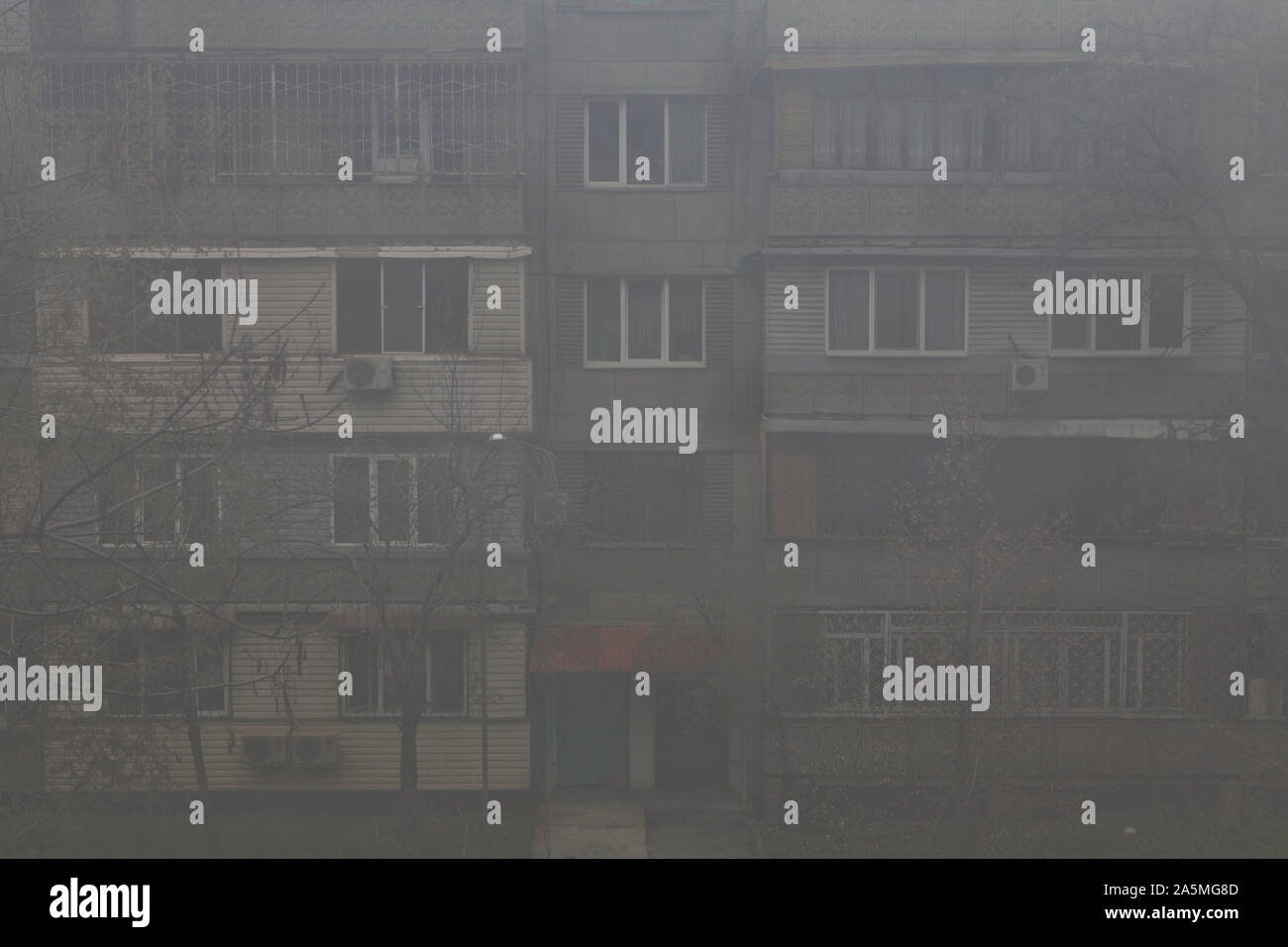 ALMATY - View on a Soviet era housing block Stock Photo - Alamy