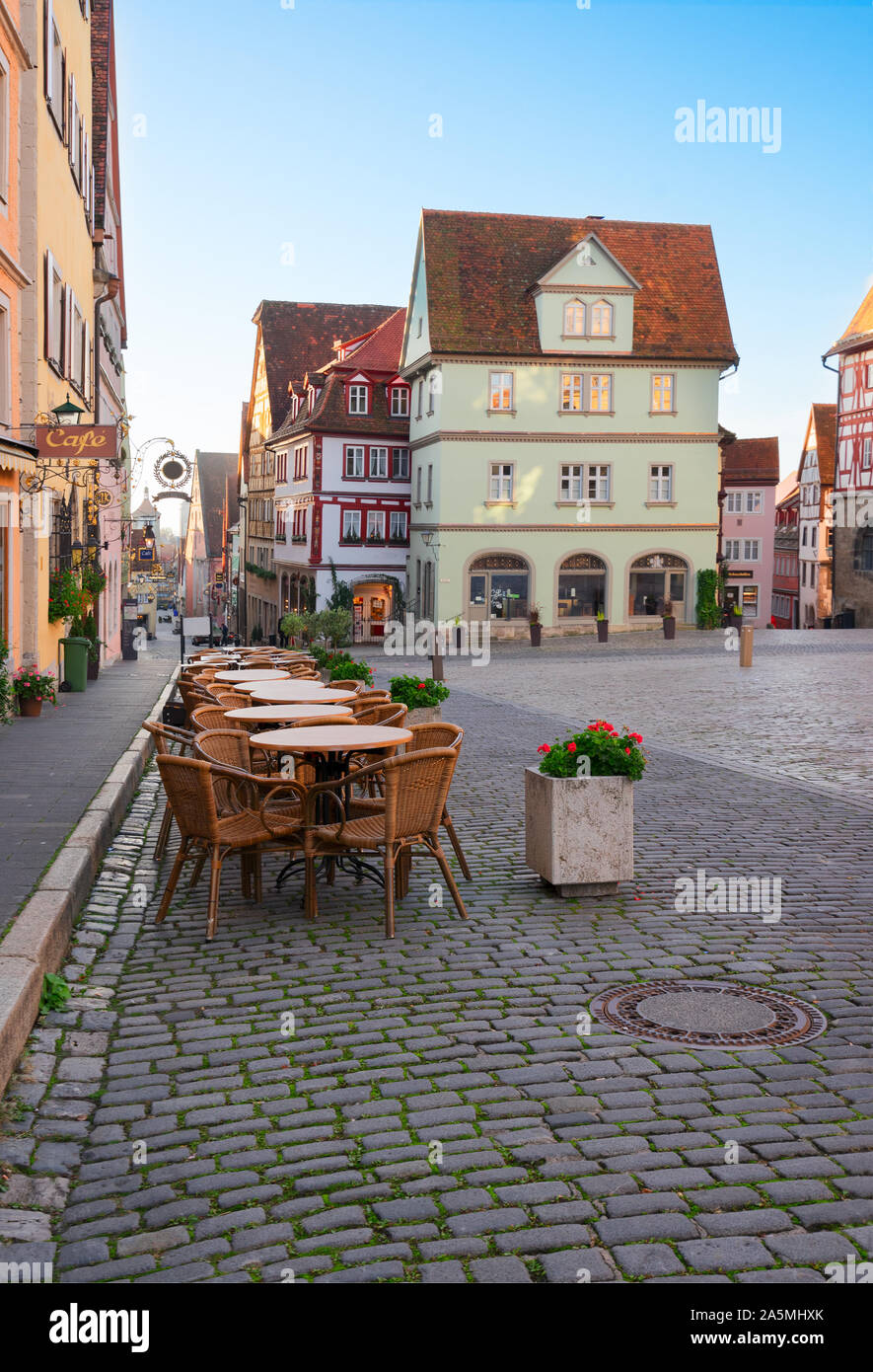 old street with outdoor cafe, Rothenburg ob der Tauber, Germany Stock ...