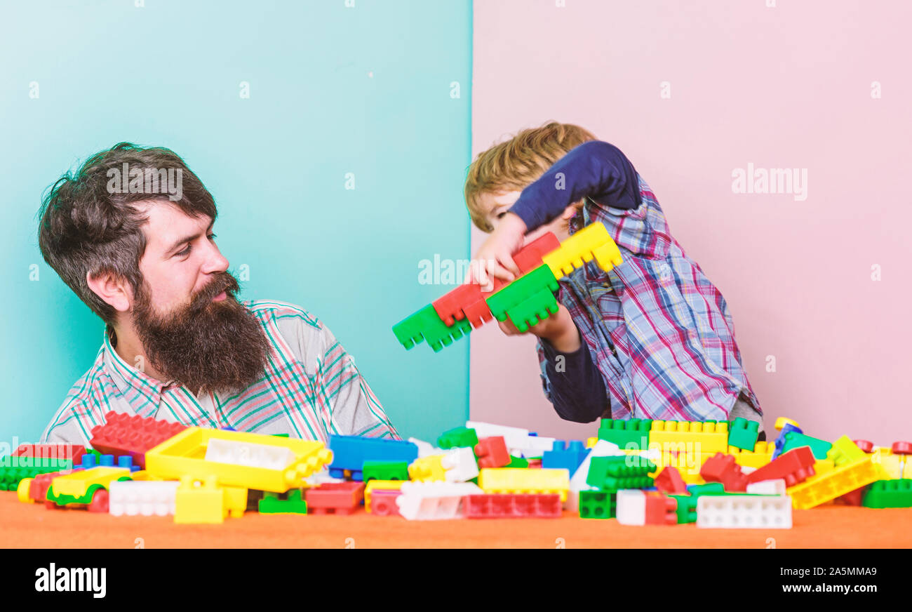 building plane with colorful constructor. happy family leisure. father ...