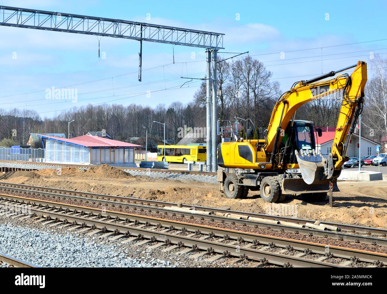excavator on railway construction Stock Photo - Alamy