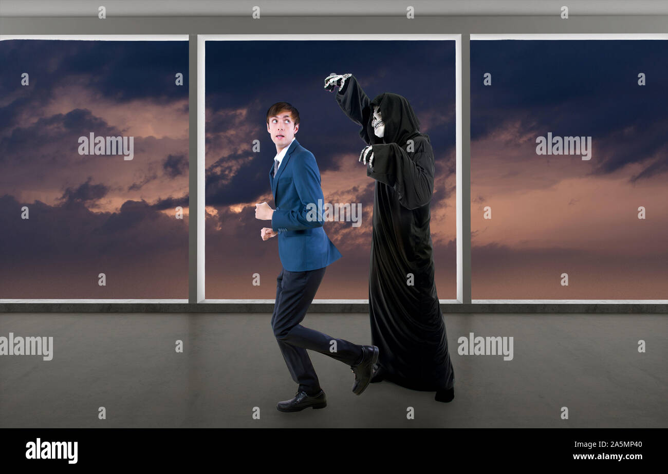 Man running in suit with fear hi-res stock photography and images - Alamy