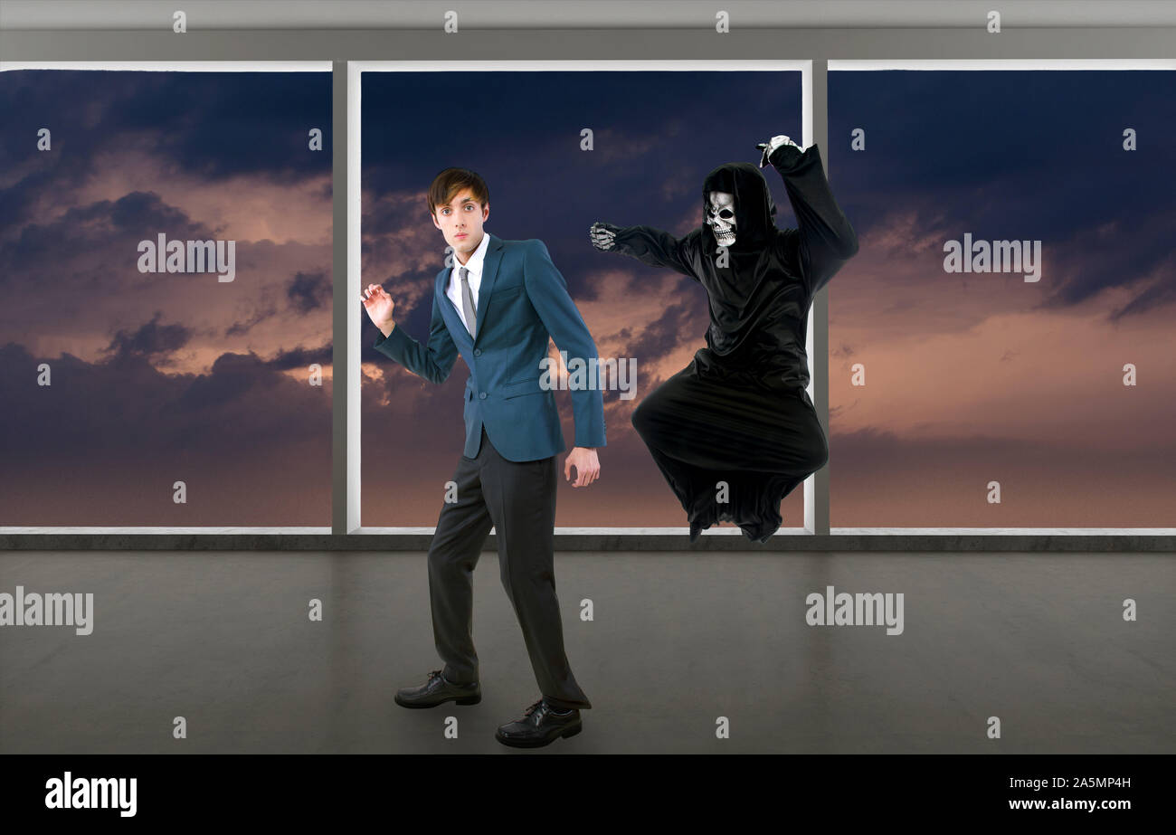 Man running in suit with fear hi-res stock photography and images - Alamy